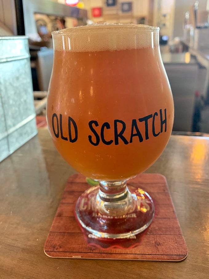 Craft beer served in proper glassware&mdash;because respect for good beer is as important as respect for good pizza. That amber glow promises hoppy happiness.