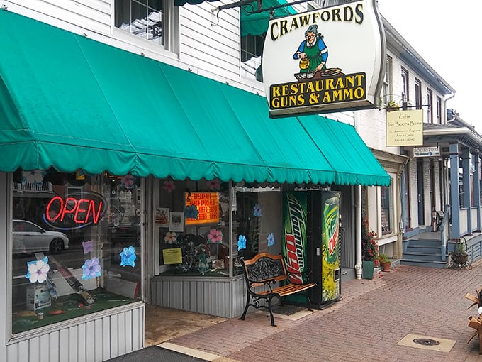 Crawford's unique "Restaurant, Guns & Ammo" sign perfectly captures small-town America's delightful quirks &ndash; where practical needs meet unexpected combinations.