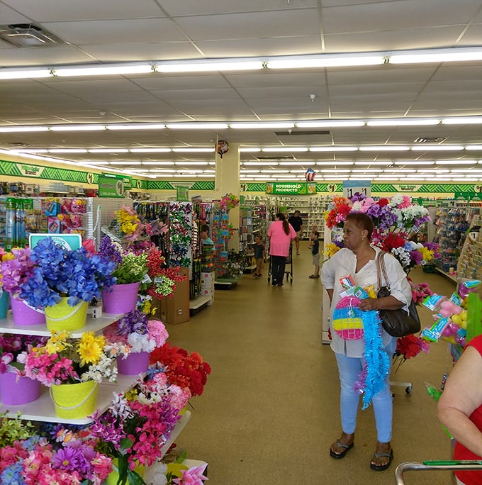 Shoppers navigate the floral department, where vibrant artificial blooms offer permanent spring regardless of Mississippi's weather.