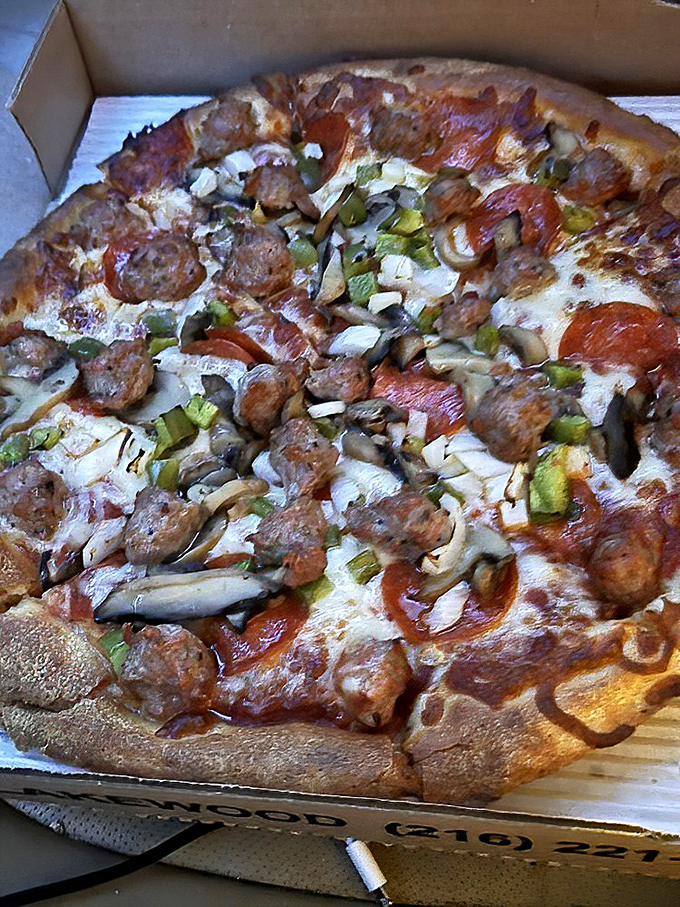 The Deluxe isn't just loaded with toppings&mdash;it's having an existential crisis about whether it's still technically a pizza or now a full-blown meal.