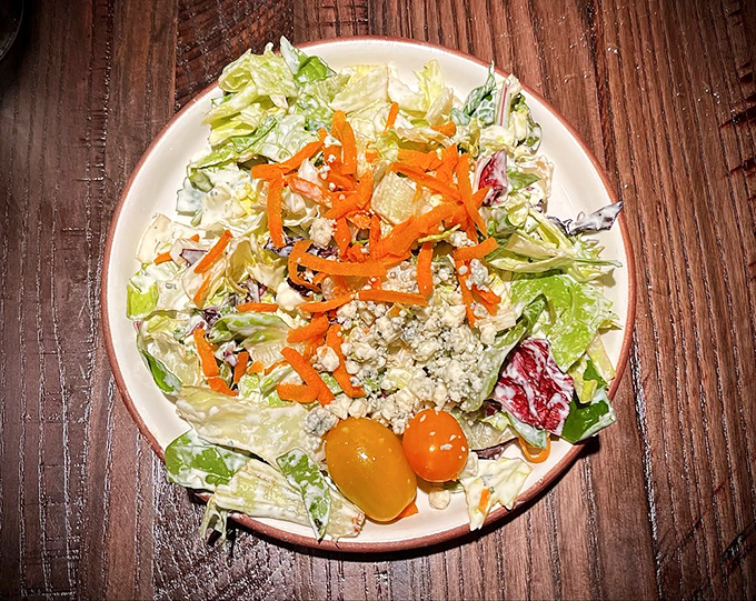 A dinner salad that doesn't apologize for being simple&mdash;crisp lettuce, fresh vegetables, and just enough dressing to keep things interesting.