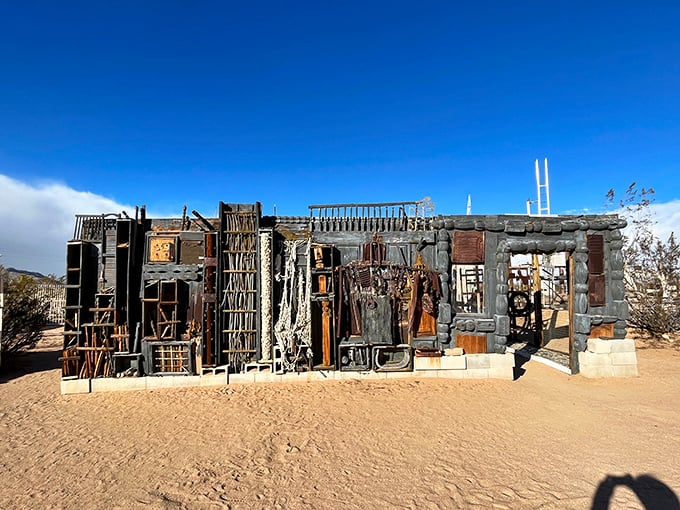 The office from a post-apocalyptic fever dream. Vintage computers and a weathered chair wait patiently for an employee who clocked out decades ago.