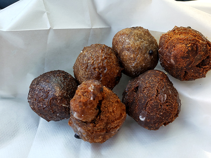 Donut holes: the ultimate "no one will notice if I eat just one more" trap. These bite-sized wonders disappear faster than your New Year's resolutions. 