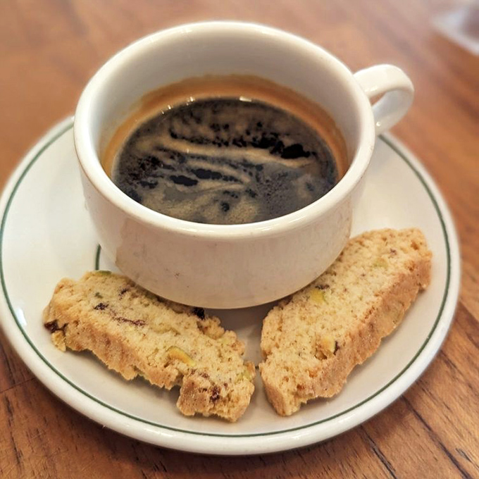 Coffee and biscotti: the dynamic duo that proves sometimes the simplest pleasures are the most profound culinary statements.