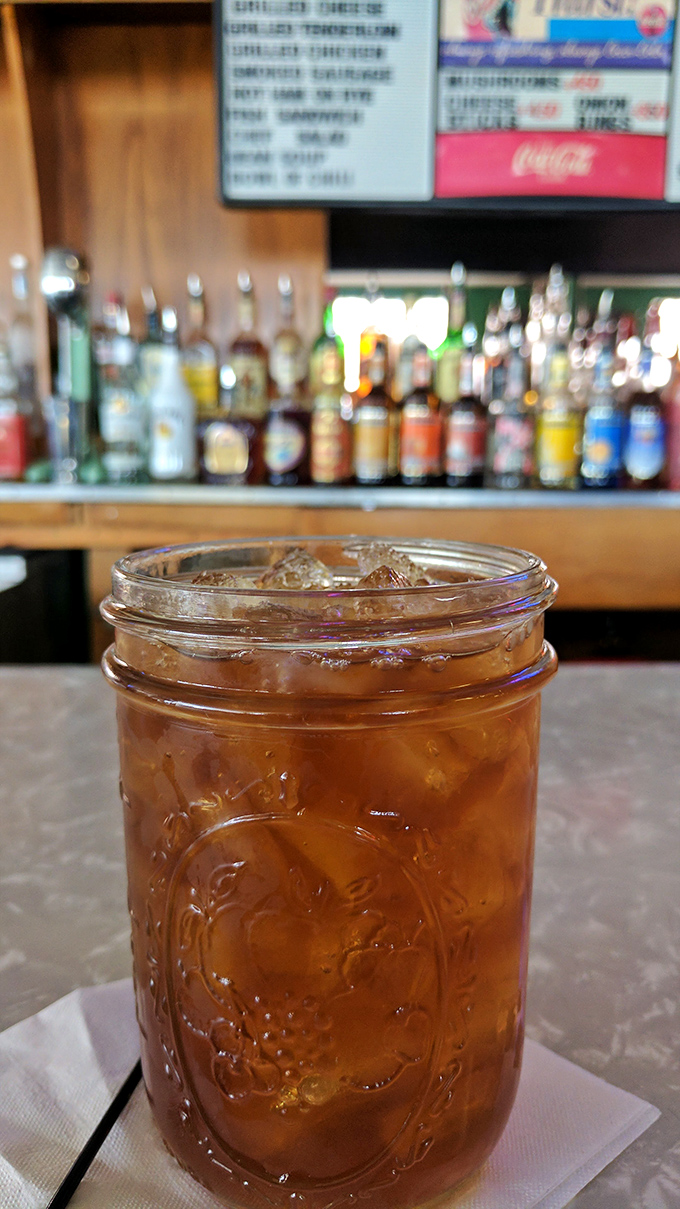 Sweet tea served in a Mason jar&mdash;because sometimes the simple pleasures are the ones that keep you coming back for more.
