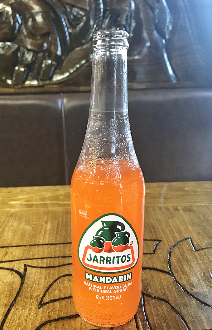 That vibrant orange Jarritos isn't just a soda &ndash; it's liquid sunshine in a bottle. The real sugar makes all the difference.