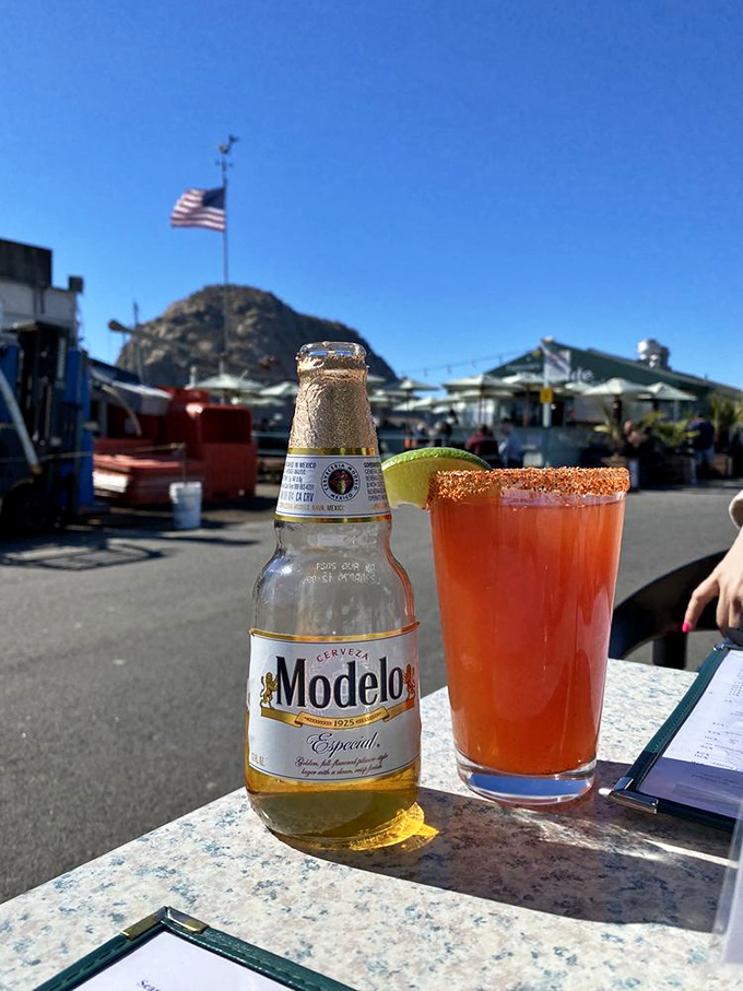 The perfect California pairing: cold Modelo meets spicy Michelada with Morro Rock photobombing in the background. Some views deserve a toast.