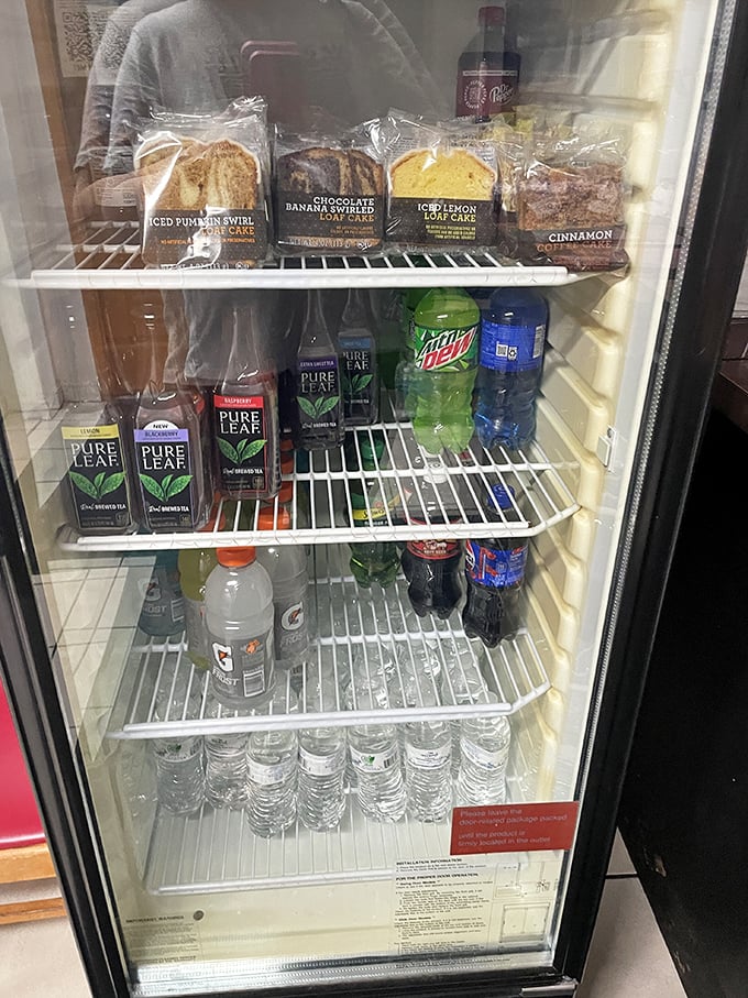 Even the drink cooler shows commitment to the cause, offering sweet treats and beverages to complement your cheesy adventure.