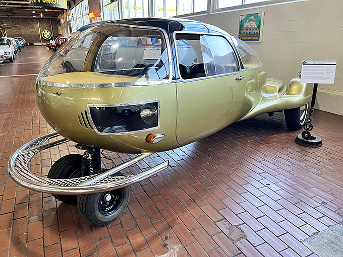 This three-wheeled marvel appears to have escaped from a 1950s sci-fi movie. The Jetsons would feel right at home behind that bubble windshield.