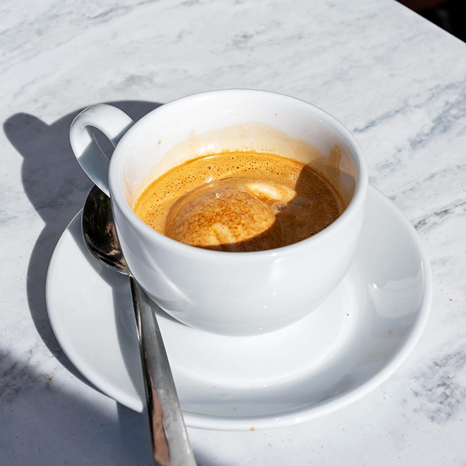 An espresso at Carmella's isn't just coffee&mdash;it's liquid motivation served in a porcelain vessel of possibility.