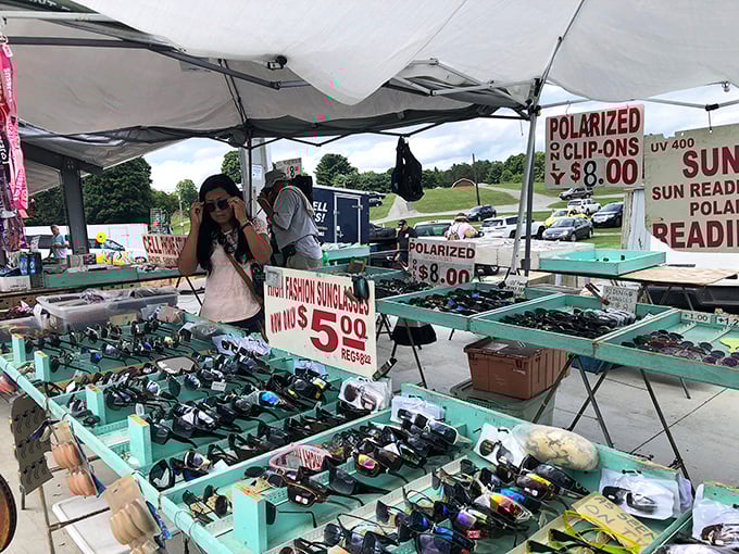 Sunglasses as far as the eye can see! This vendor's impressive display offers protection from both the sun and boring fashion choices.