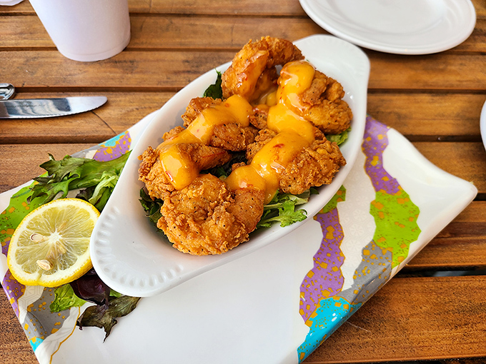 Crispy cheese shells cradle a colorful slaw that adds both crunch and zing to this innovative seafood creation.