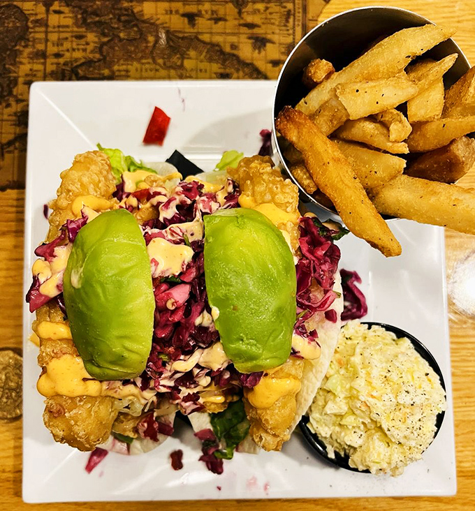 These fish tacos with vibrant slaw and avocado aren't just a meal&mdash;they're a beach vacation for your taste buds, no sunscreen required.