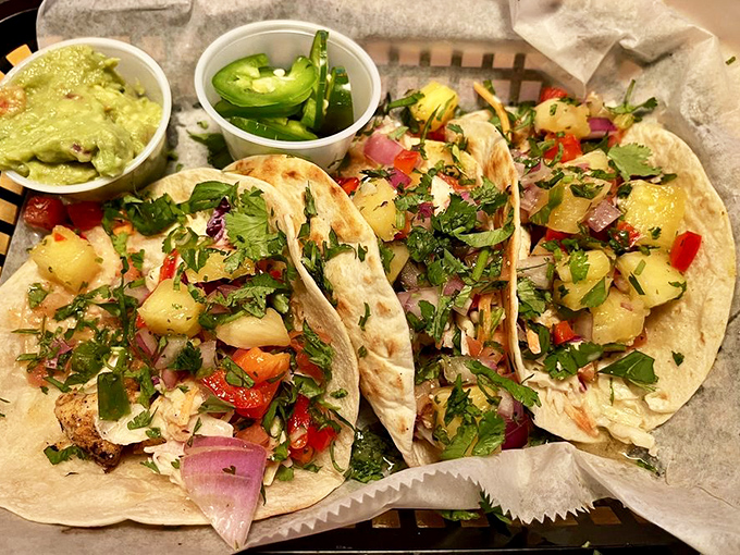 These tacos arrive like colorful canvases, where each topping is a brushstroke of flavor and the plate is a masterpiece waiting to be devoured.