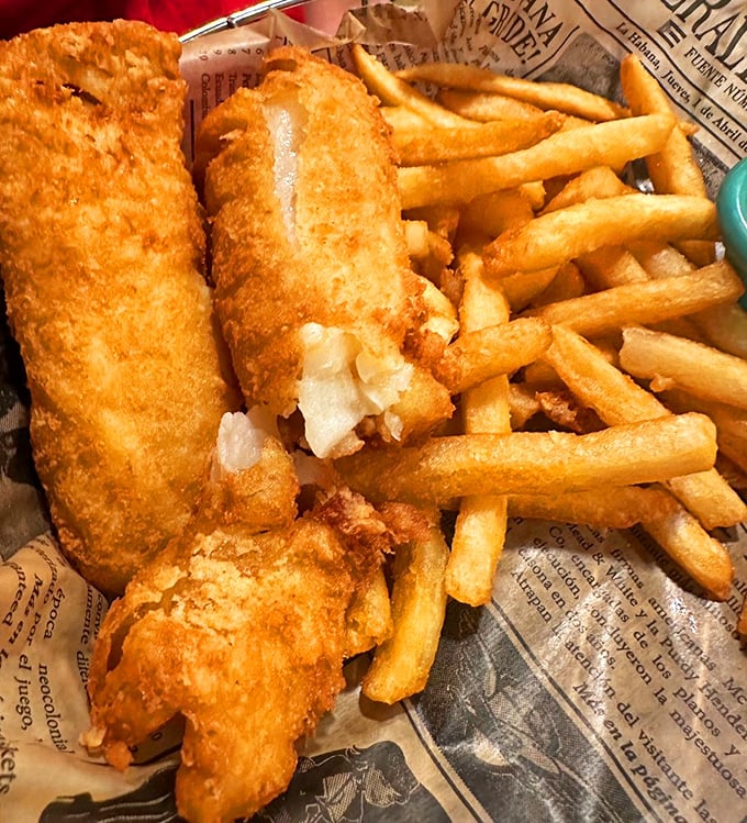 Fish and chips that would make a British pub-goer weep with joy. Newspaper wrapping: the original Instagram filter.