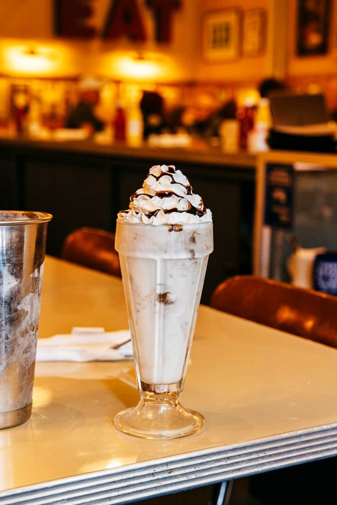 The legendary pie shake in all its glory. Whipped cream mountain atop a glacier of ice cream and pie &ndash; proof that sometimes the best innovations are the simplest.