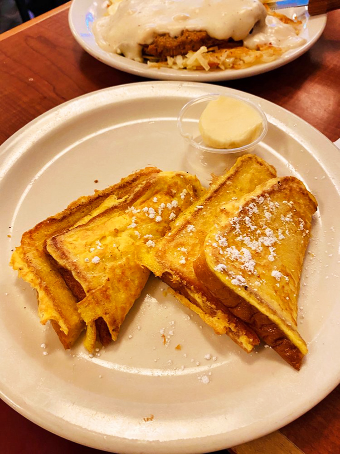 Golden-edged French toast that makes you wonder why anyone bothers with avocado toast when this classic perfection exists.