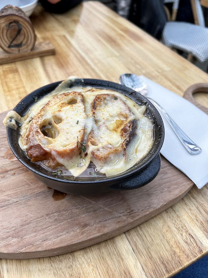 This isn't just French onion soup&mdash;it's a bubbling cauldron of comfort where bread and cheese have found their higher purpose.