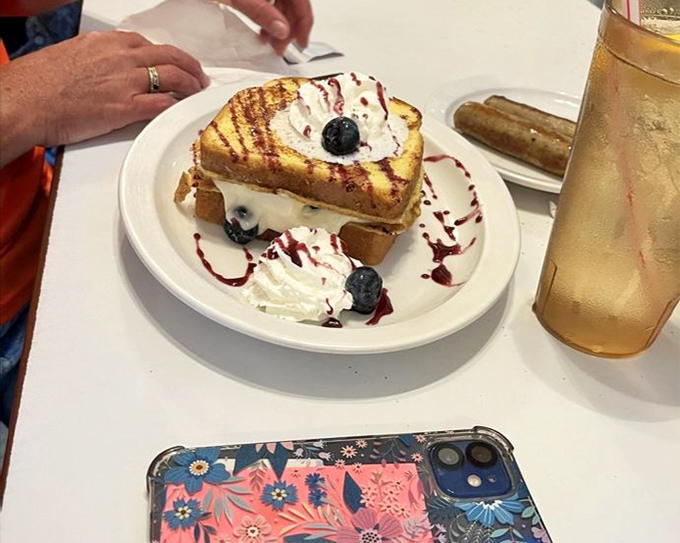 French toast that doubles as dessert, with berries, cream and syrup creating a breakfast indulgence that makes you wonder why we don't eat like this every day.