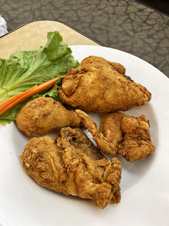 Fried chicken with that golden armor of crispy coating&mdash;proof that simple food done right is better than fancy food done wrong.