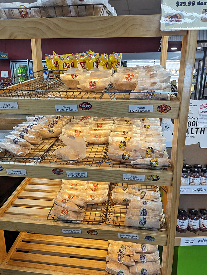 Fruit pies lined up like edible jewels. The hardest decision you'll make today is choosing between cherry, peach, or "one of each."