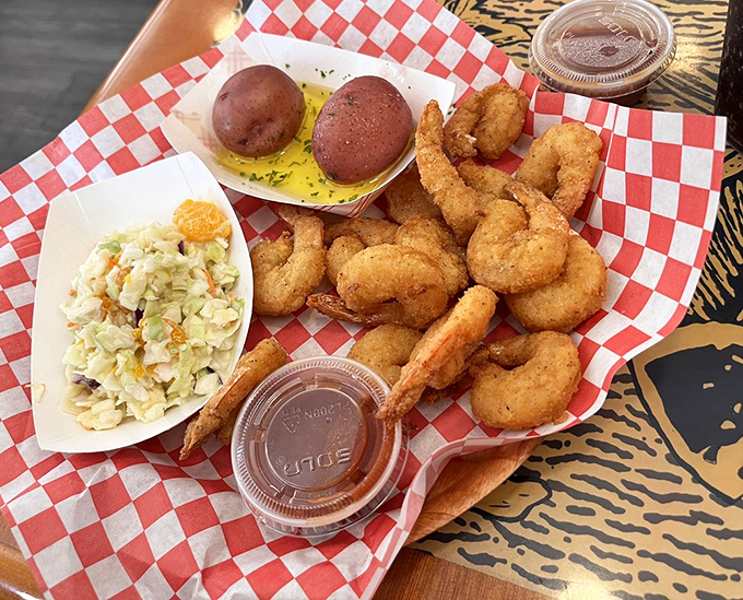 Fried shrimp that crunch like they mean it, served with red potatoes and coleslaw &ndash; the holy trinity of Florida seafood platters.