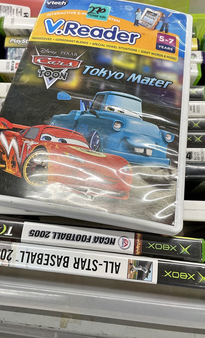 Nostalgia for sale: childhood memories nestled between plastic cases. That Cars VReader might entertain another generation of tiny fingers.