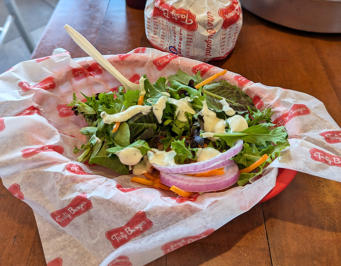 A garden salad that doesn't feel like punishment. Proof that vegetables can hang out at a burger joint and still maintain their dignity.