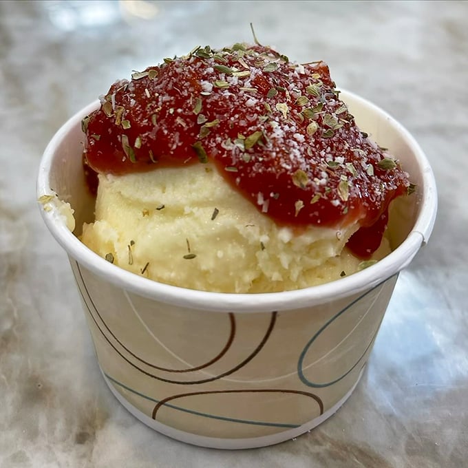 Comfort food that hugs your soul—creamy polenta topped with marinara that would make any nonna nod in silent, teary-eyed approval.