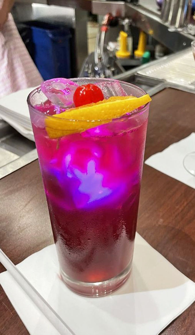 This isn't just a drink—it's a science experiment gone deliciously right, complete with glowing ice cubes that would make Edison jealous.