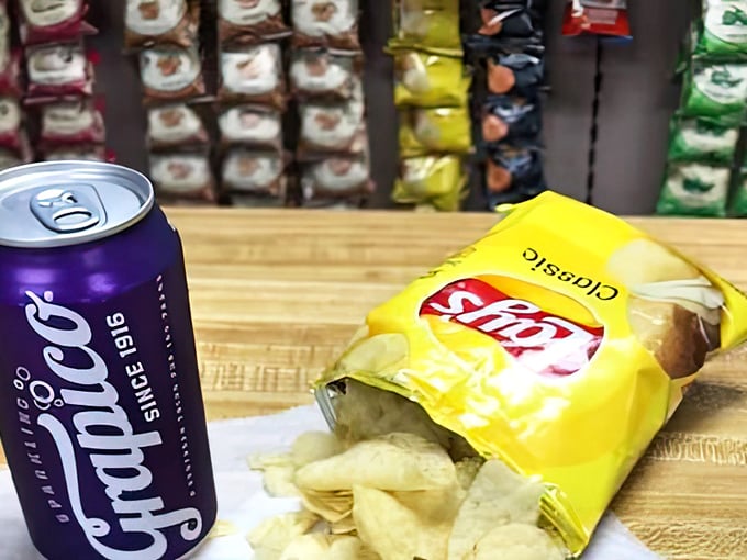 The perfect sidekicks to your hot dog adventure: a cold Grapico soda and crisp chips, because some traditions are too good to mess with.
