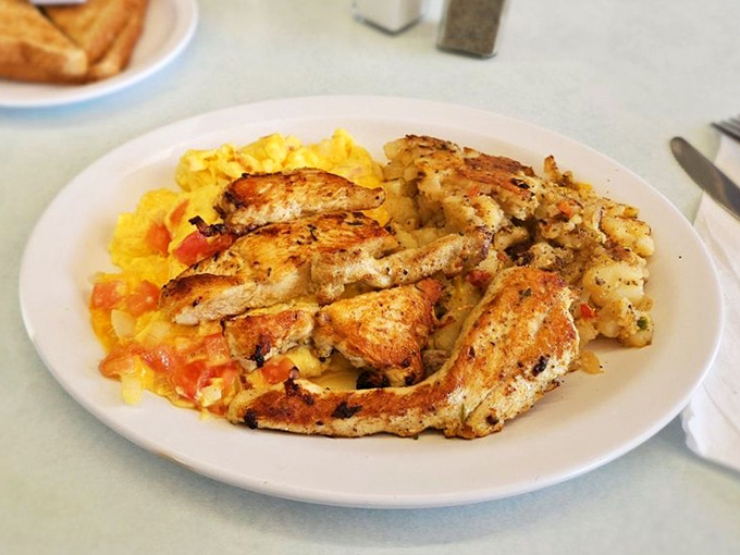 Grilled chicken breast proves breakfast doesn't have to choose between hearty and surprisingly sophisticated flavors.