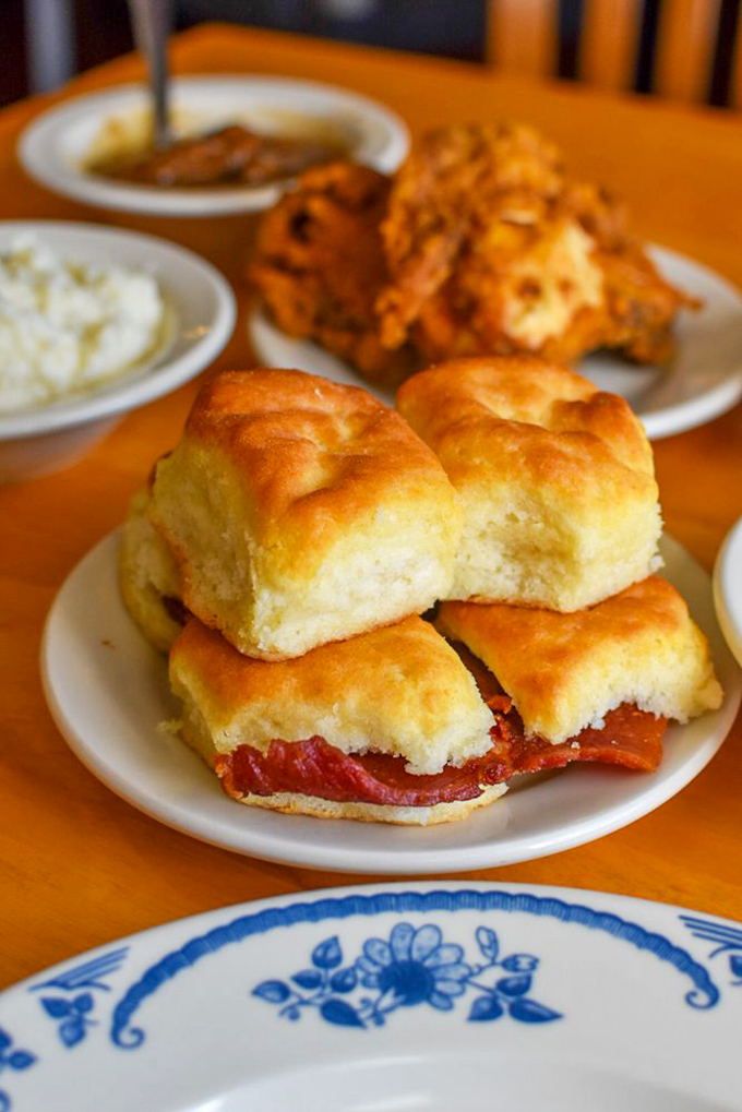 Pillowy biscuits cradling salty country ham&mdash;a perfect marriage that's lasted longer than most Hollywood couples and twice as satisfying.