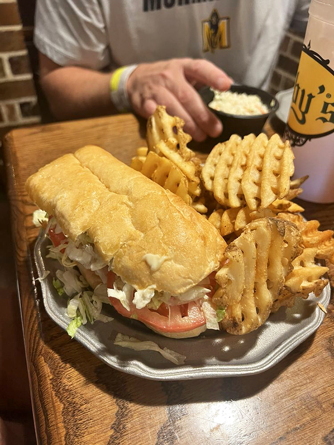 This po-boy doesn't need to brag&mdash;the pillowy bread and generous fillings speak volumes about Oby's commitment to sandwich excellence.