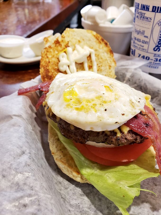 Breakfast and burger had a beautiful baby&mdash;topped with a sunny-side-up egg that's ready to create the sauce nature intended.