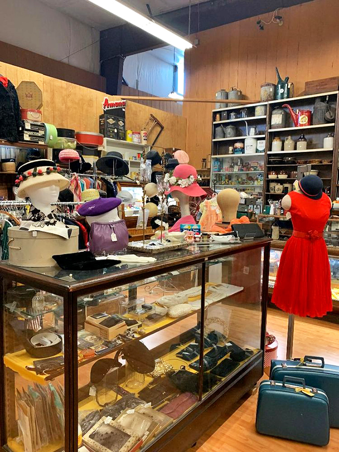Vintage fashion heaven where yesterday's styles await their comeback. That red dress has stories to tell, and those hats are begging for a second chance.