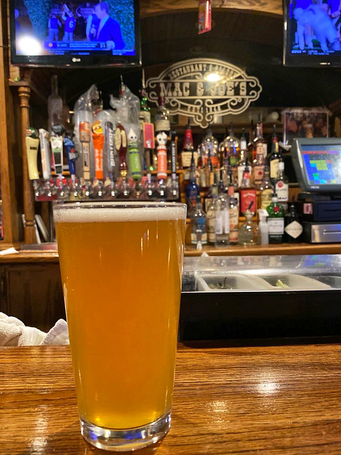 A perfectly poured golden IPA catching the bar light just right. Beer isn't just a beverage here&mdash;it's a supporting character in your Oxford story. 
