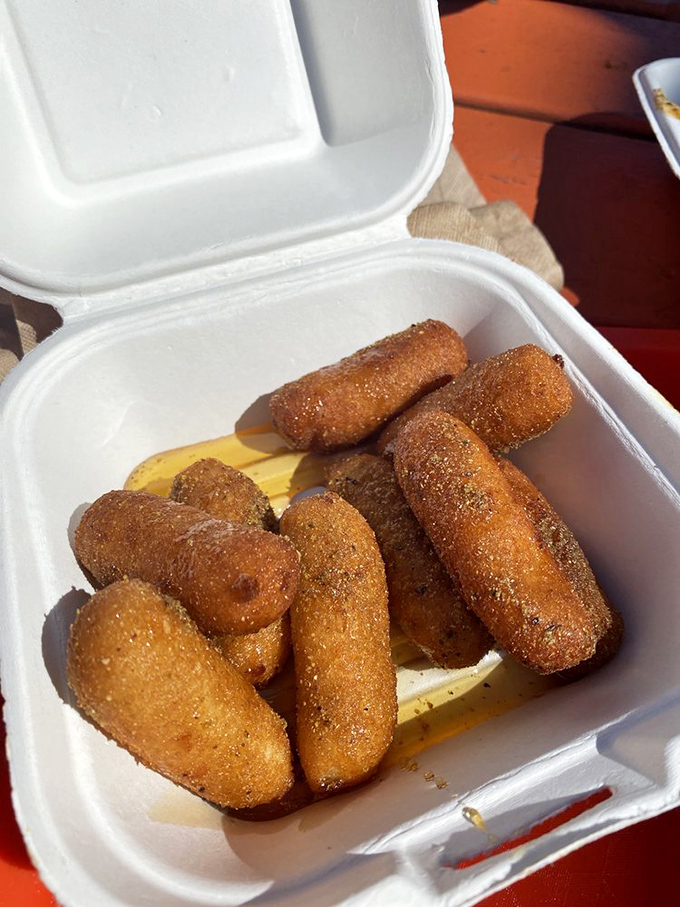 Hushpuppies that deserve their own fan club. These golden orbs of cornmeal perfection might just upstage the seafood they accompany.