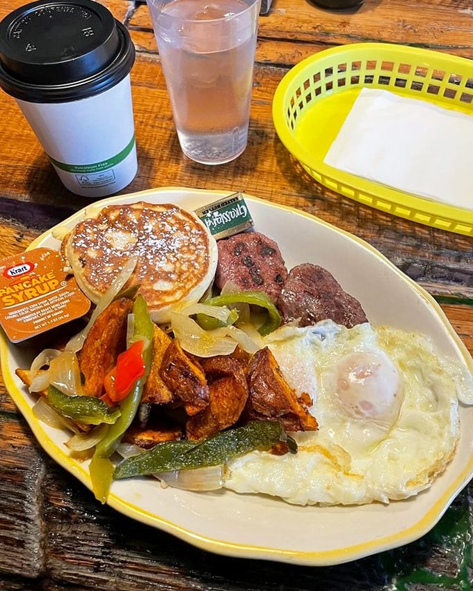 This breakfast platter doesn't just feed you&mdash;it adopts you. Eggs, home fries, peppers, and onions creating a symphony of morning flavors.