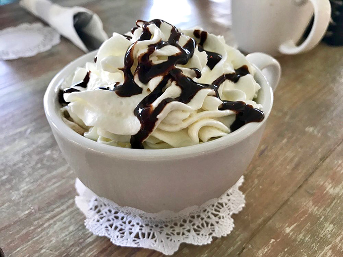 Hot chocolate that's dressed better than most of us on a Friday night, with chocolate drizzle playing the role of fashionable accessory. 