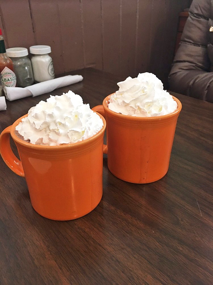 Hot chocolate that doesn't mess around. These orange mugs hold winter warmth that puts Swiss Miss to shame.