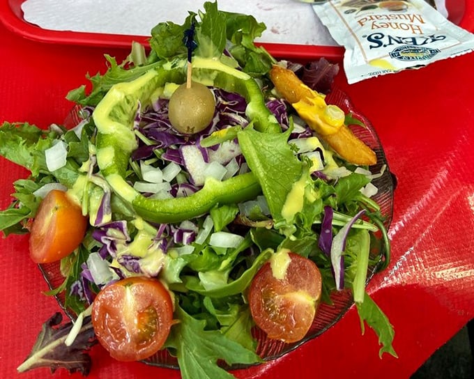 Even the salads at The Jigger Shop look like celebrations&mdash;crisp greens, vibrant vegetables, and a sense that healthy choices deserve beautiful presentation too.