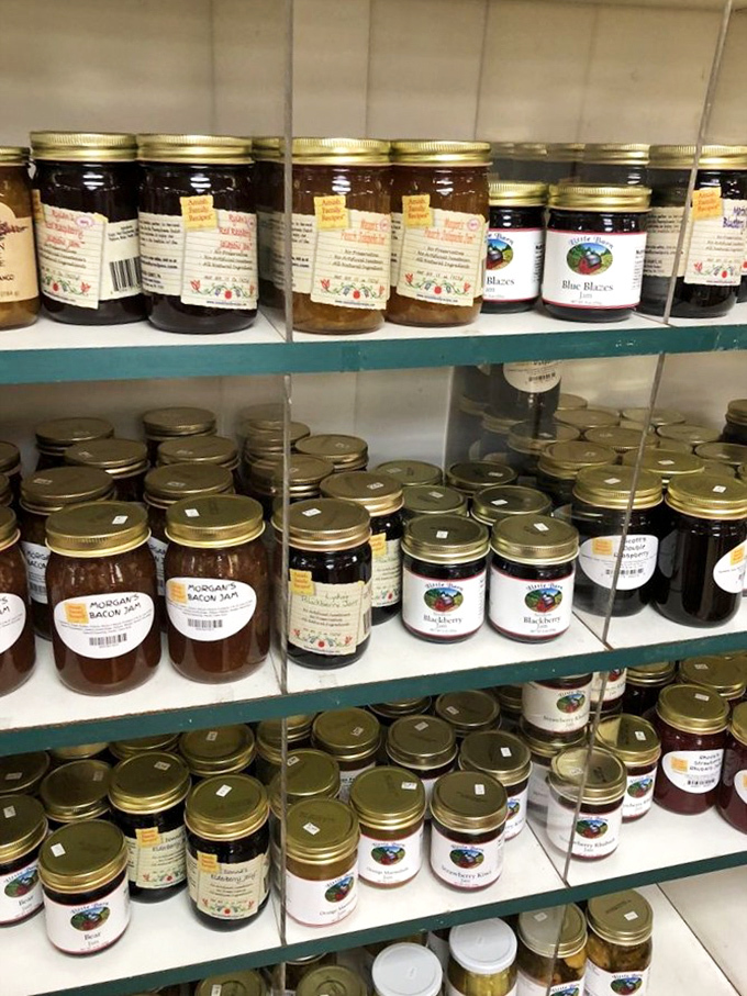 Jars of homemade preserves stand at attention, each one capturing summer's bounty in glass time capsules of fruity perfection.