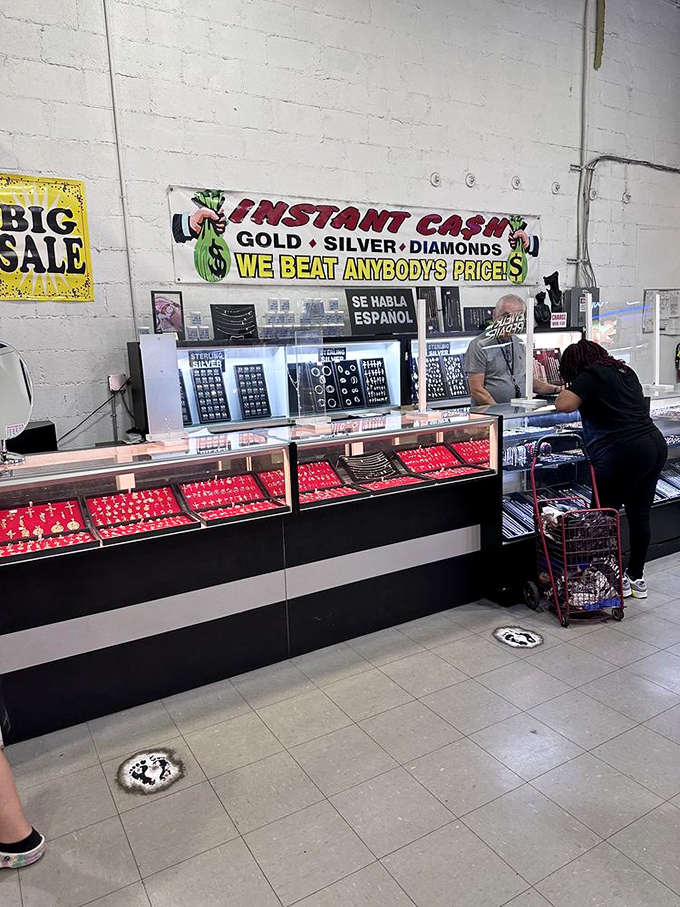 Jewelry cases glitter with possibilities under "INSTANT CASH" signs. Where one person's heirloom becomes another's new statement piece.