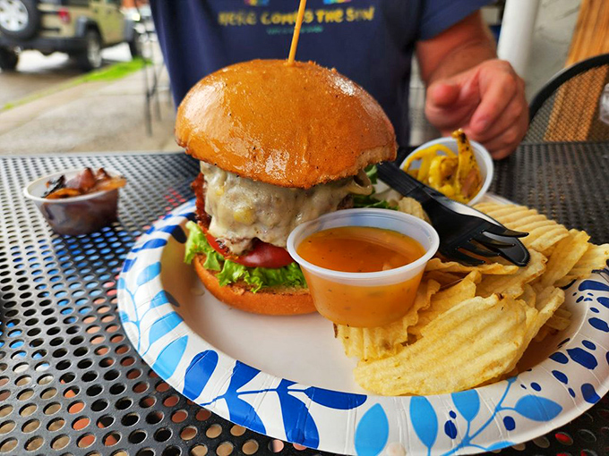 When a burger arrives with a knife stabbed dramatically into its heart, you know you're in for a serious relationship with your meal.