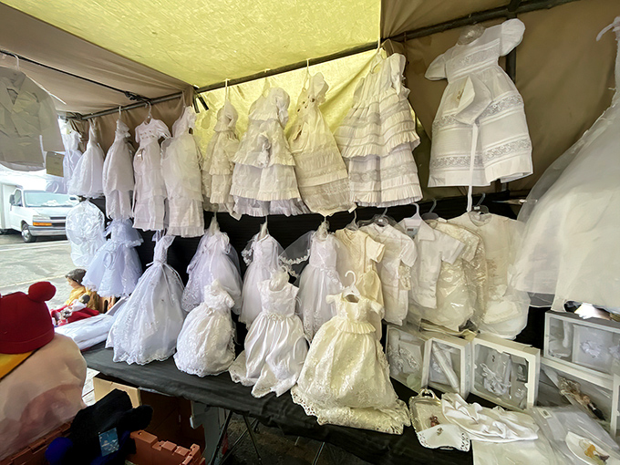 Tiny white dresses flutter in the breeze&mdash;baptism and celebration gowns waiting for their moment in a family's milestone memories.