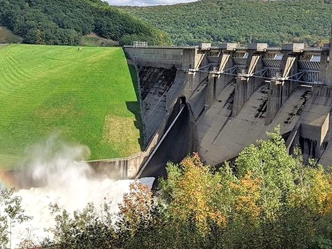 The Kinzua Dam stands as an impressive feat of engineering, where rushing water meets concrete in a display of controlled power.