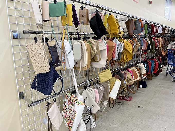 Handbag heaven! Designer lookalikes and genuine vintage purses dangle like fashionable fruit ripe for the picking.