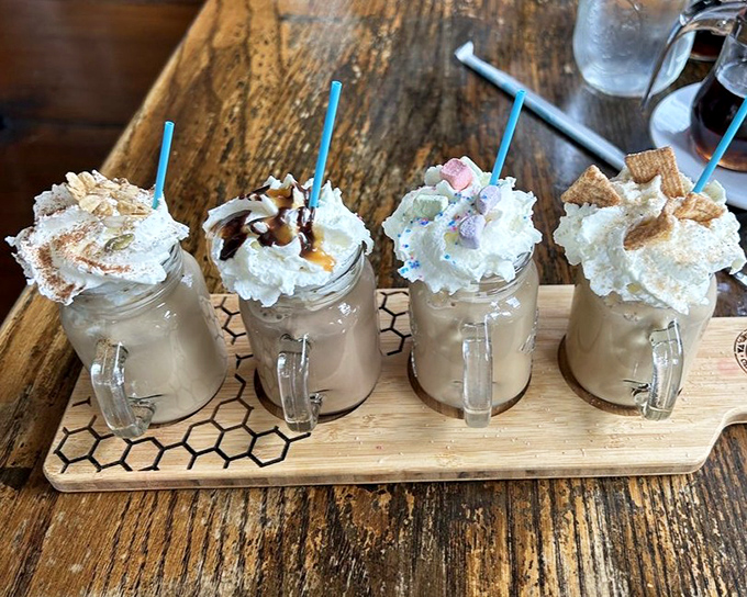 Coffee flights that turn morning caffeine into a tasting adventure, with whipped cream mountains that deserve their own topographical maps.
