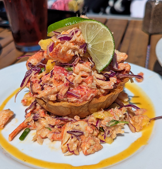 A tower of lobster that's dressed better for summer than most beachgoers. That lime wedge isn't just garnish&mdash;it's the exclamation point.
